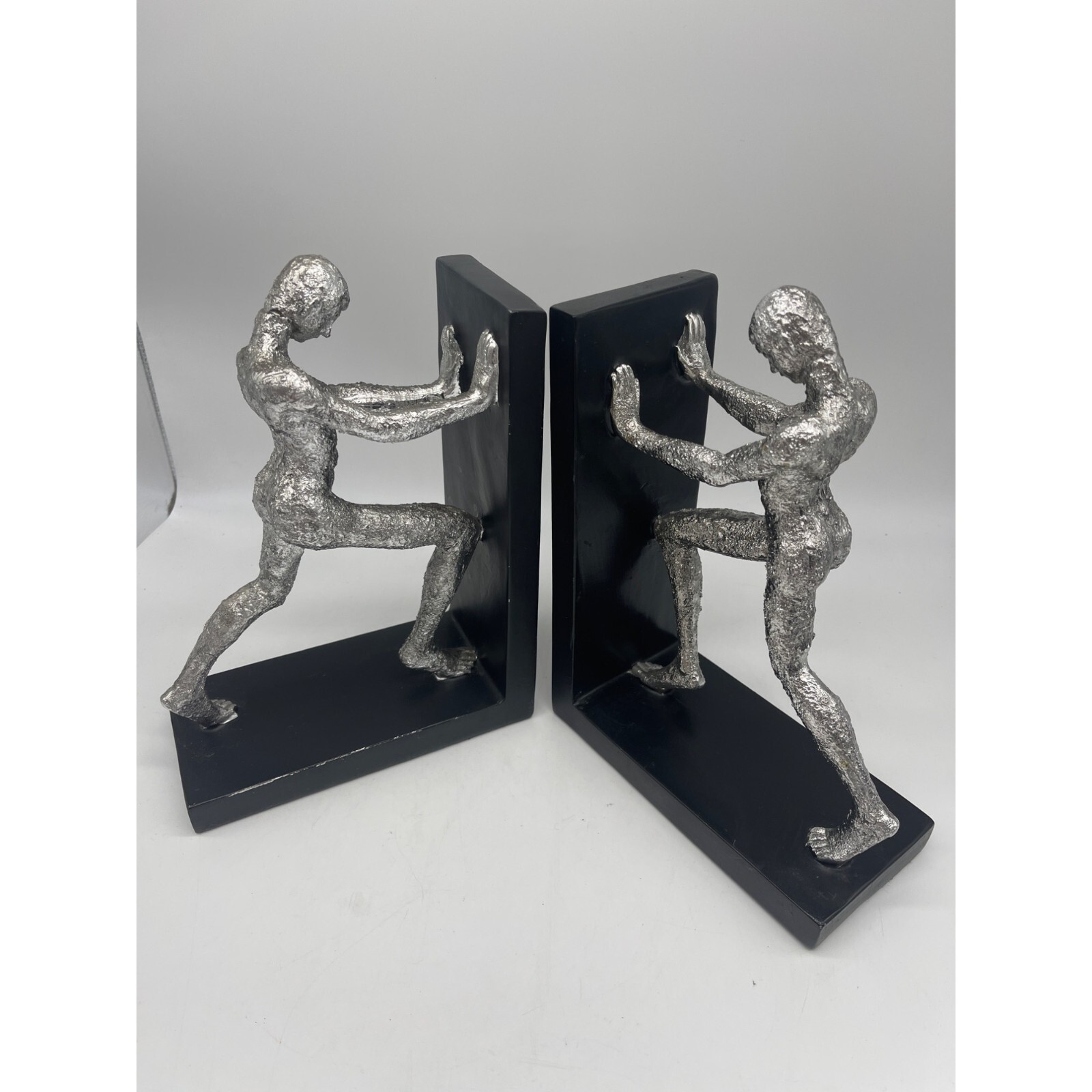 Metal Sliver Men Pushing Sculpture Balck / Silver Bookends | eBay