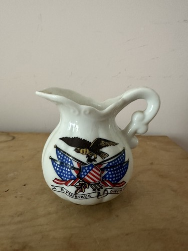 A Porcelain Creamer with Patriotic Decoration of Flags & Eagle E ...