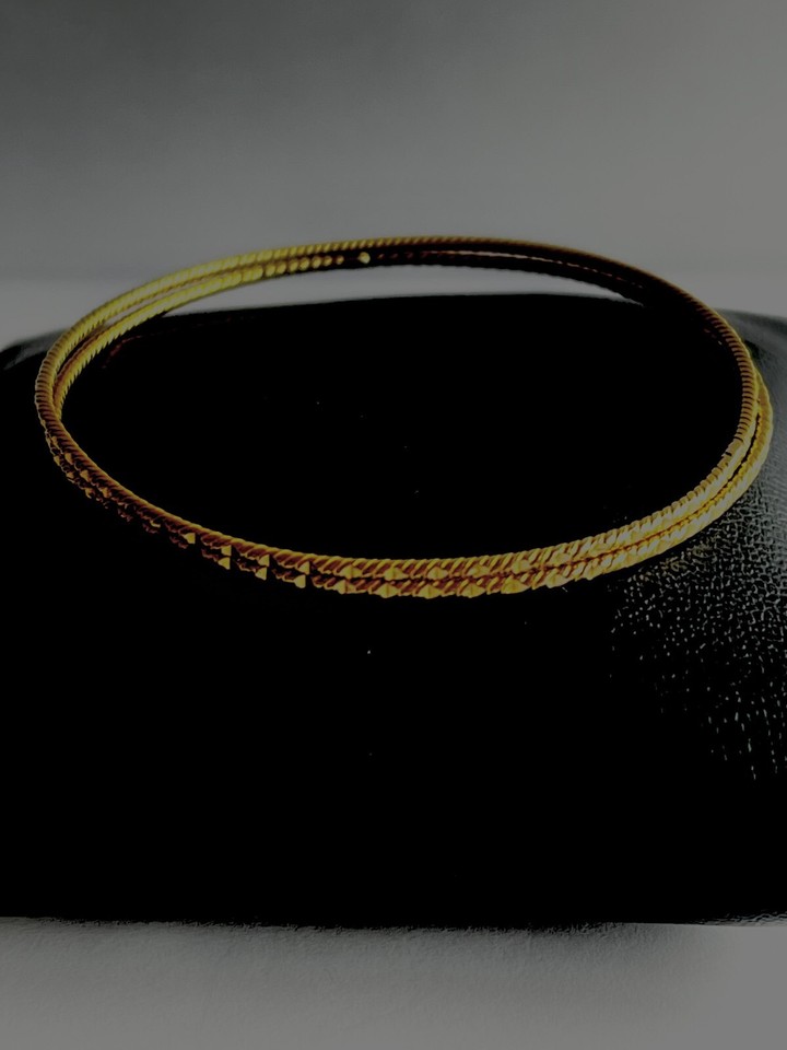 Two 21K Gold Bahrain Diamond Cut Rope Style Solid Bangle Bracelets ...