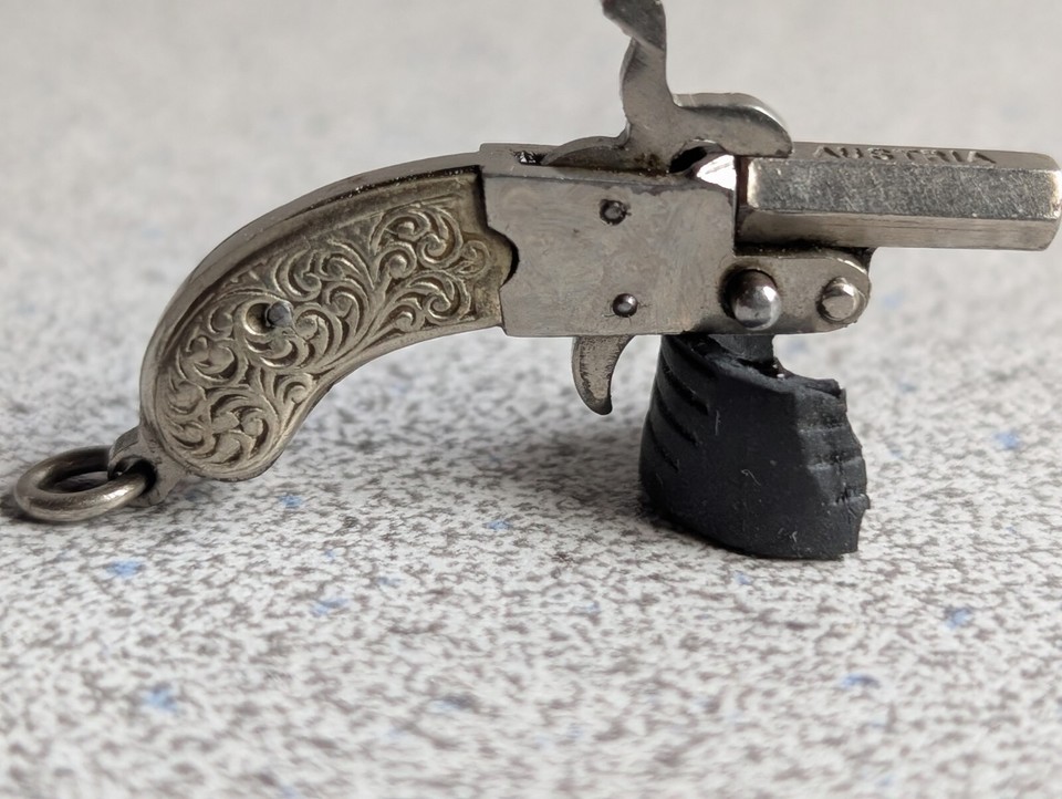 ANTQ PIN FIRED MINI PISTOL DECORATIVE AUSTRIAN CAP GUN KEY CHAIN CHARM ...