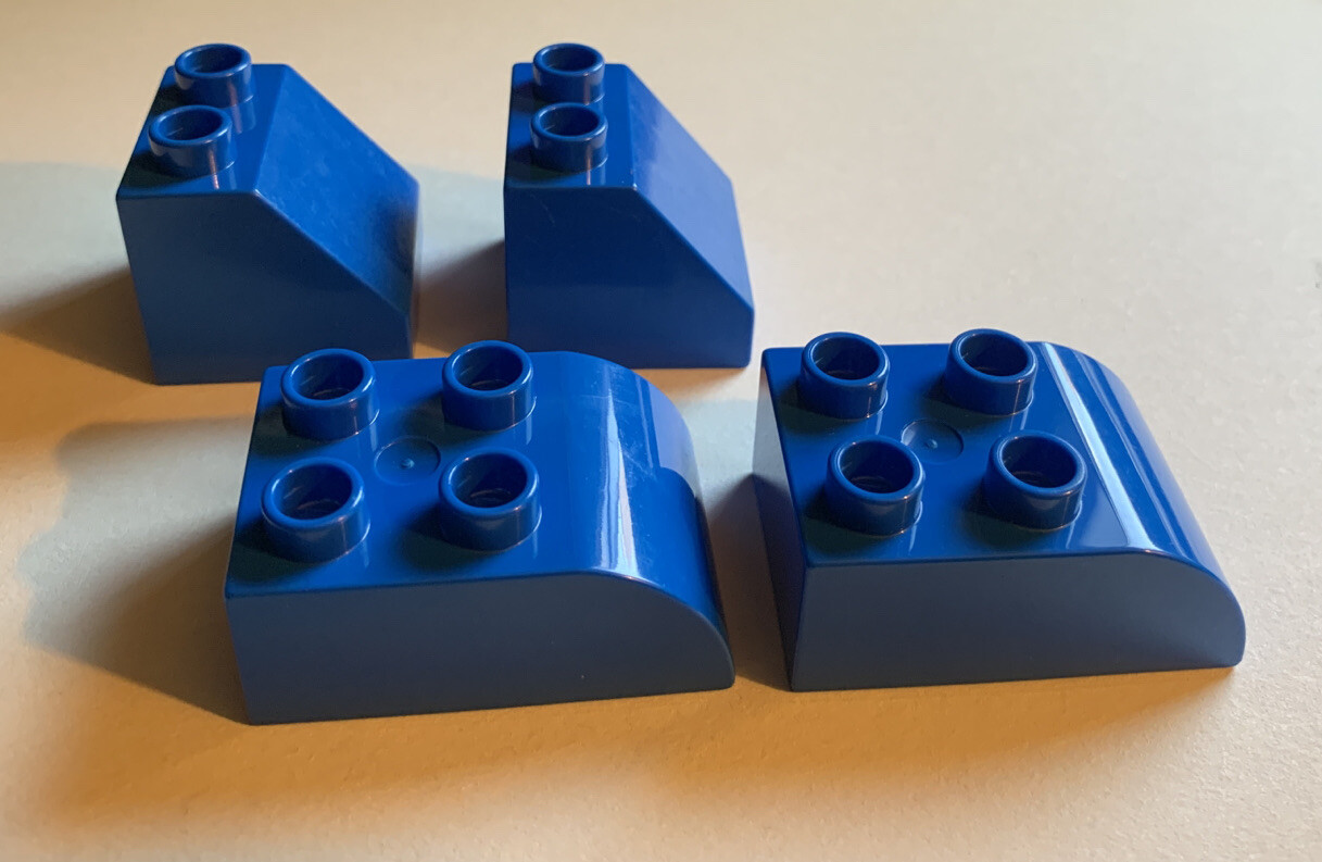 lot of 4 assorted blue Duplo blocks- 2x2 and 2X3 sloped- combined ship ...