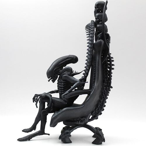 Alien Warrior in an HR Giger Chair Stroking a Facehugger Desk Art ...