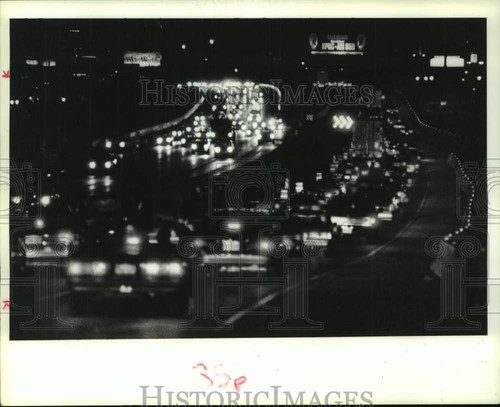 1990 Press Photo Nighttime Traffic Backup on Southwest Freeway in ...