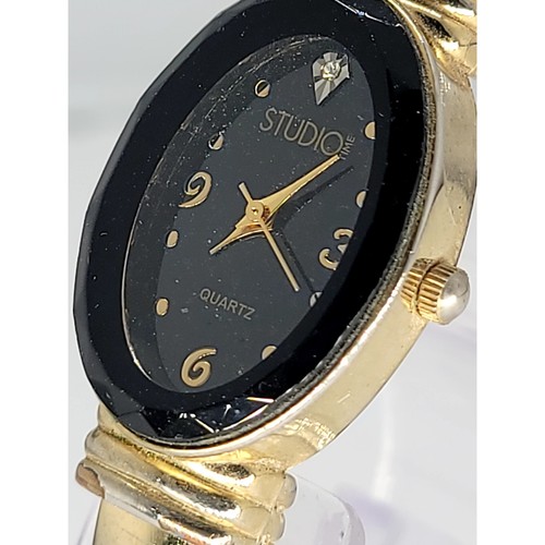 Vintage Studio Quartz Womens Gold Tone Cuff Bracelet Watch Black Oval ...