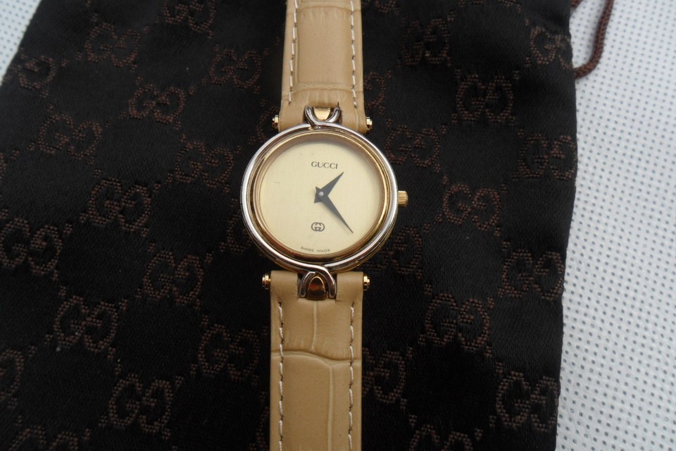 Gucci Ladies 4500L Watch Gold bezel and chrome intertwined on Face ...