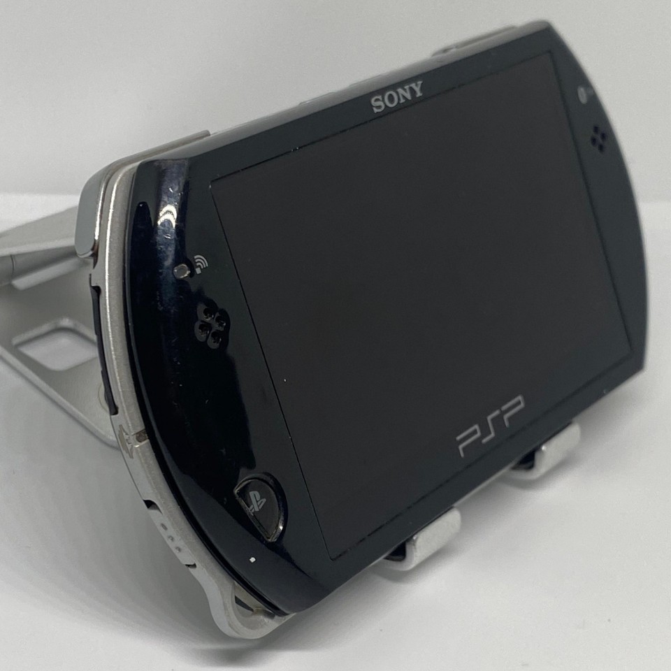 PSP Go PlayStation Portable PSP N1001 With A Charger & Lot Of Games ...