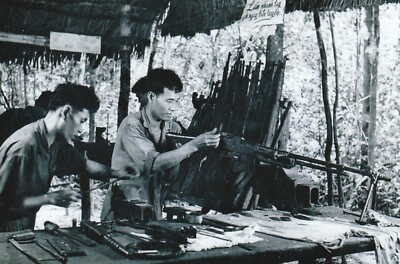 Vietnam War Photos -- VC Soldiers Repairing Guns | eBay