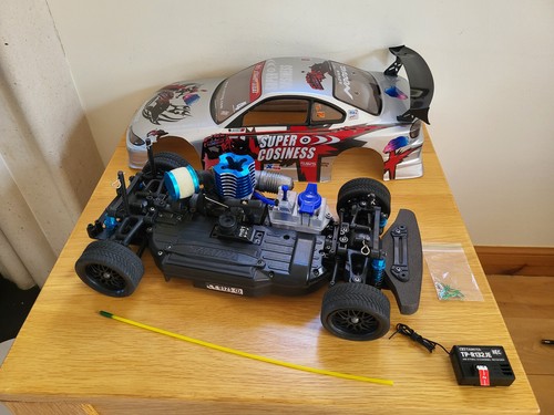 Tamiya TGS Nitro RC Car - 1/10 Scale Rolling Chassis with Leaxn Body ...