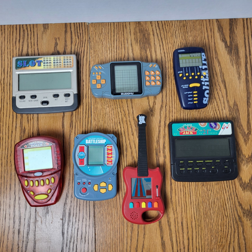 Handheld Electronic Game Lot of 7 Guitar Hero Slot Poker Battleship ...