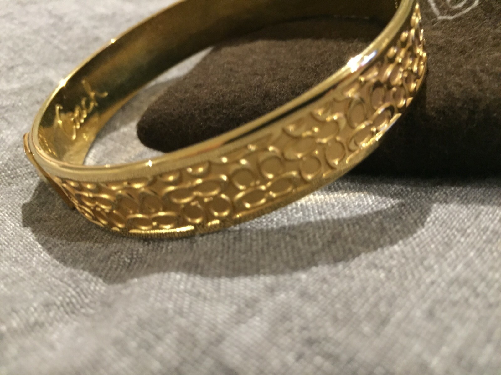 COACH Bangle Bracelet, GOLD TONE, Signature Embossed - Gem