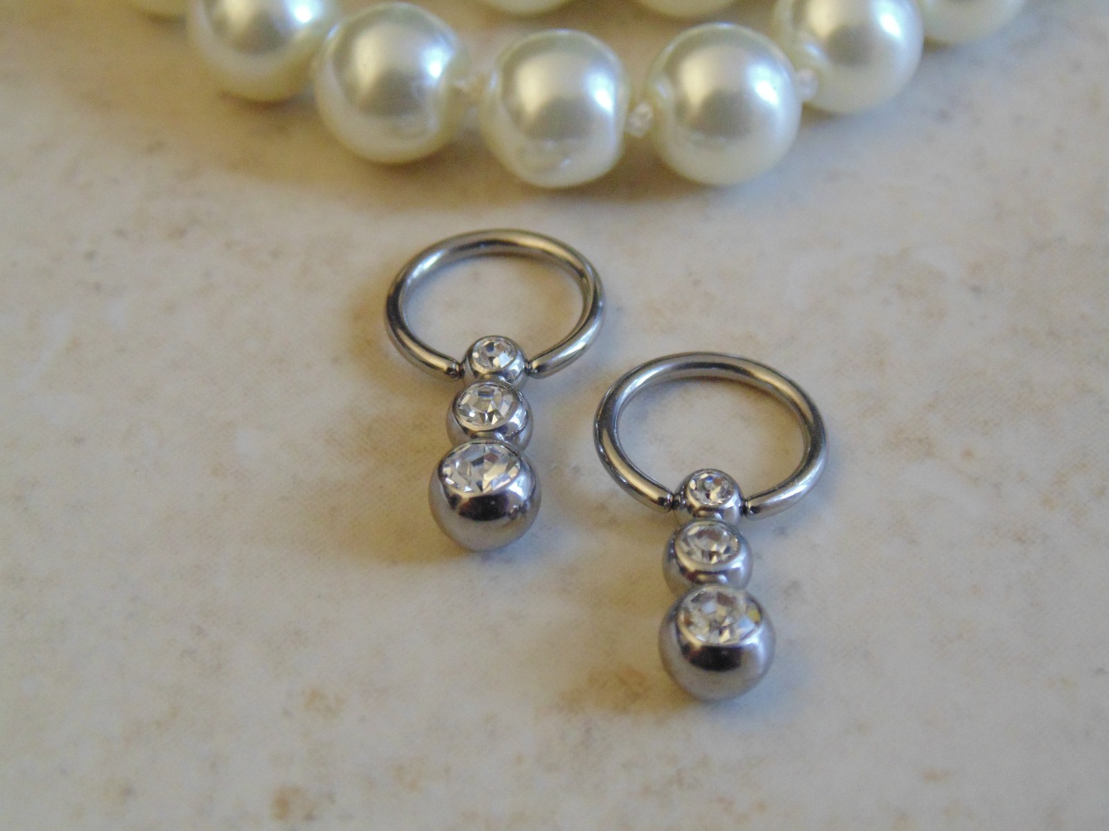 Captive Bead Ring with Gemmed Cascading Triple Ball Nipple Ring. | eBay