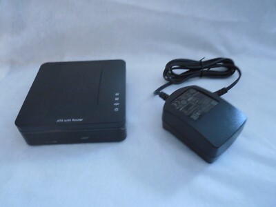 Cisco SPA122 ATA with Router Combines VoIP services with an internal ...