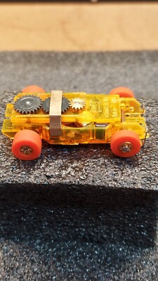 Auto World Translucent Orange Thunderjet Ultra-G Chassis Adjustable ...