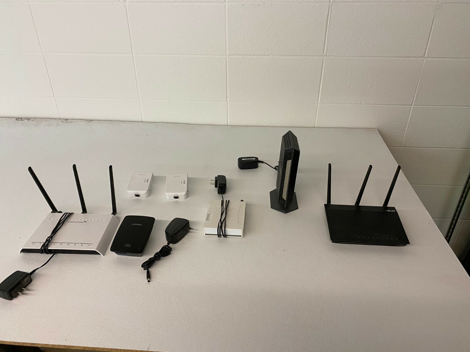 Lot of Netgear, Asus, ZyXel, and Linksys networking equipment | eBay