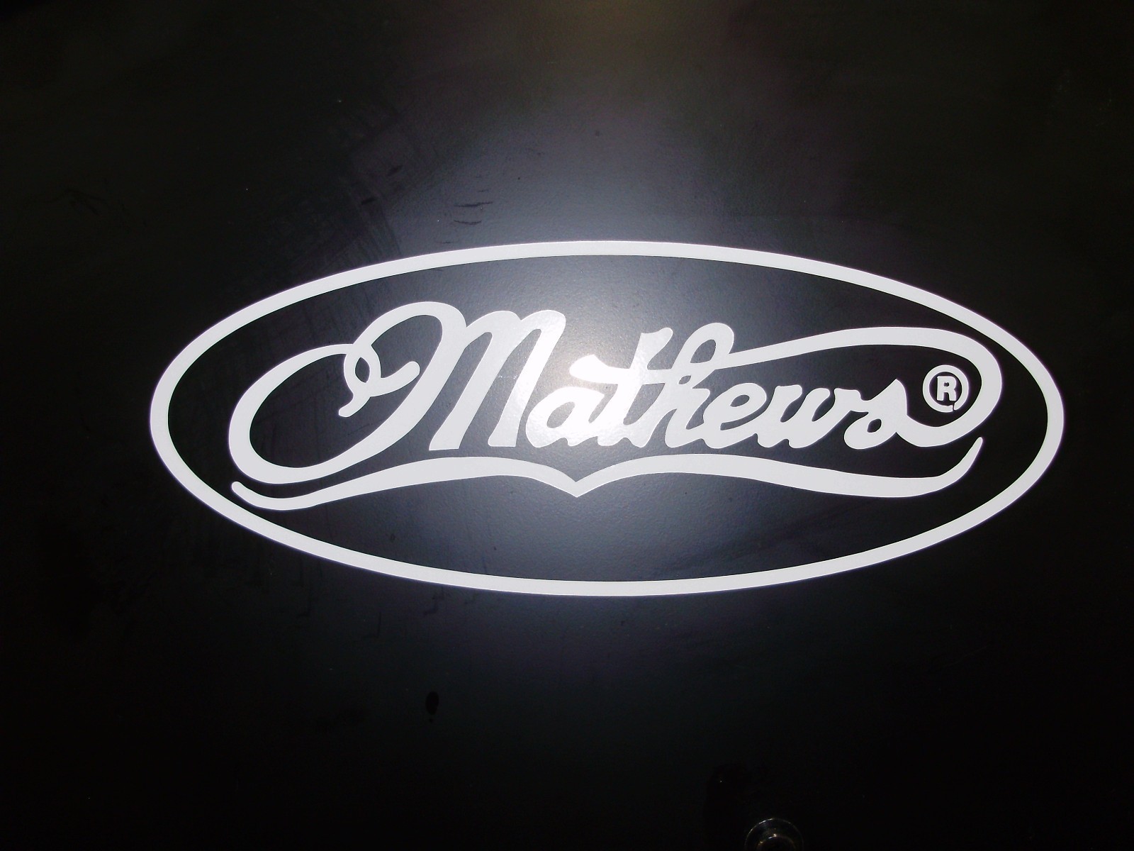 Mathews Logo Wallpaper