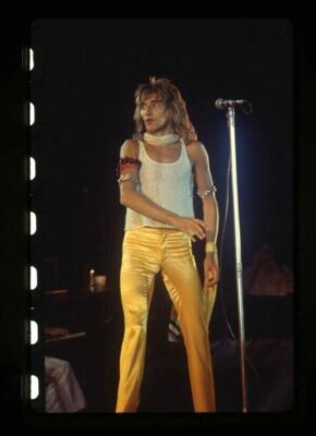 Rod Stewart Iconic Concert in vest and yellow tight pants Original ...