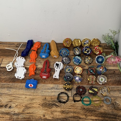 Beyblade Lot of Burst Beyblades + String Launcher | eBay