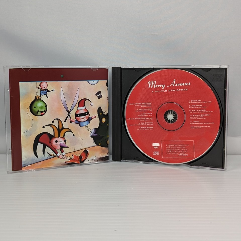 Merry Axemas A Guitar Christmas CD Jeff Beck Steve Vai Joe Perry Joe ...