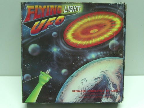80'S VINTAGE FLYING LIGHT UFO SAUCER PULL CORD STRING TOY MIB TAIWAN | eBay