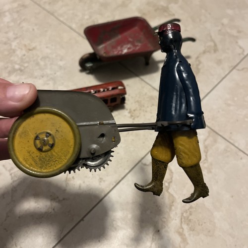 Set Of Three Vintage Tin Toys, Train Car, Wheelbarrow, And Wind Up ...
