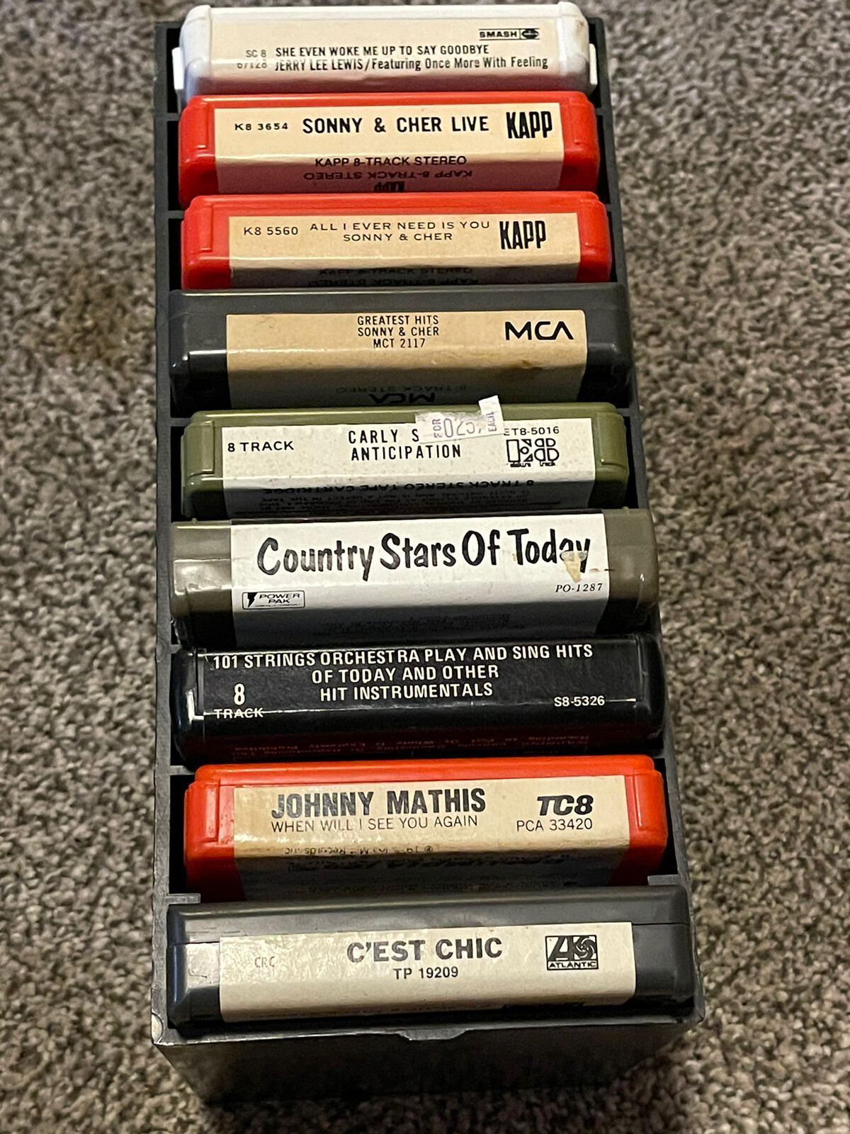 Lot of 9 - 8 track tapes with Plastic Case- Sonny/Cher, Carly Simon Etc ...