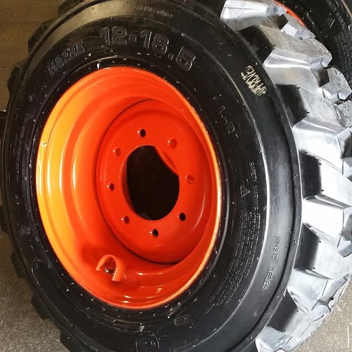 4 - 12-16.5 Skid Steer Bobcat Tires mounted on rims 9.75x16 12x16.5 14 ...