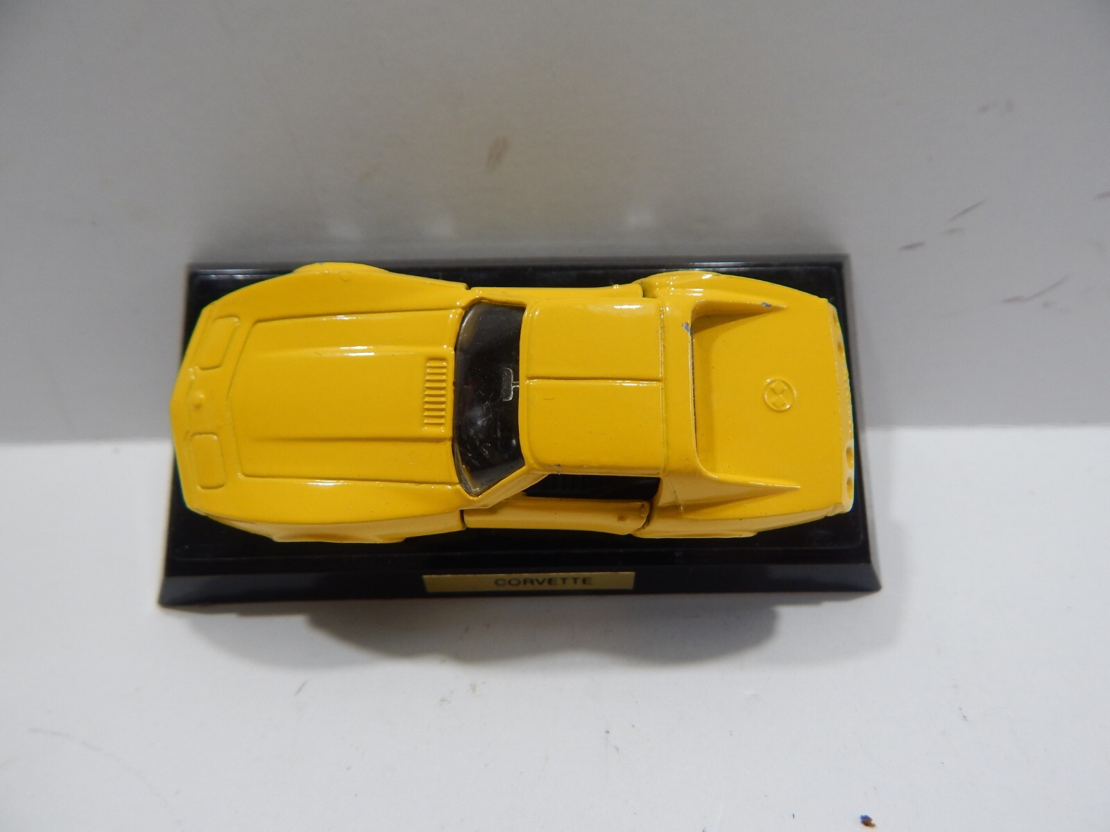 Vintage 1:64 Yellow Chevrolet Corvette w/ opening doors black interior ...