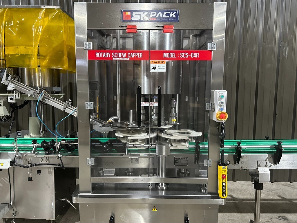 2016 SK Pack Bottling Line Bottle Rinser, Filler Capper Sleeve Labeler ...