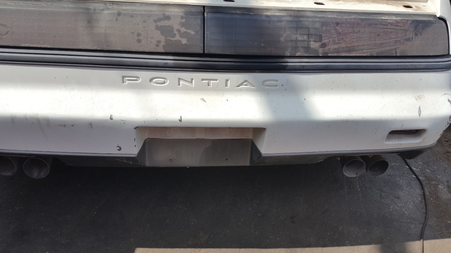 85 Fiero GT rear Bumper in white will need to be re-painted USED OEM | eBay