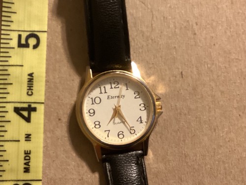 Eternity Quartz Watch Gold Tone Dial Round Case White Face Black ...