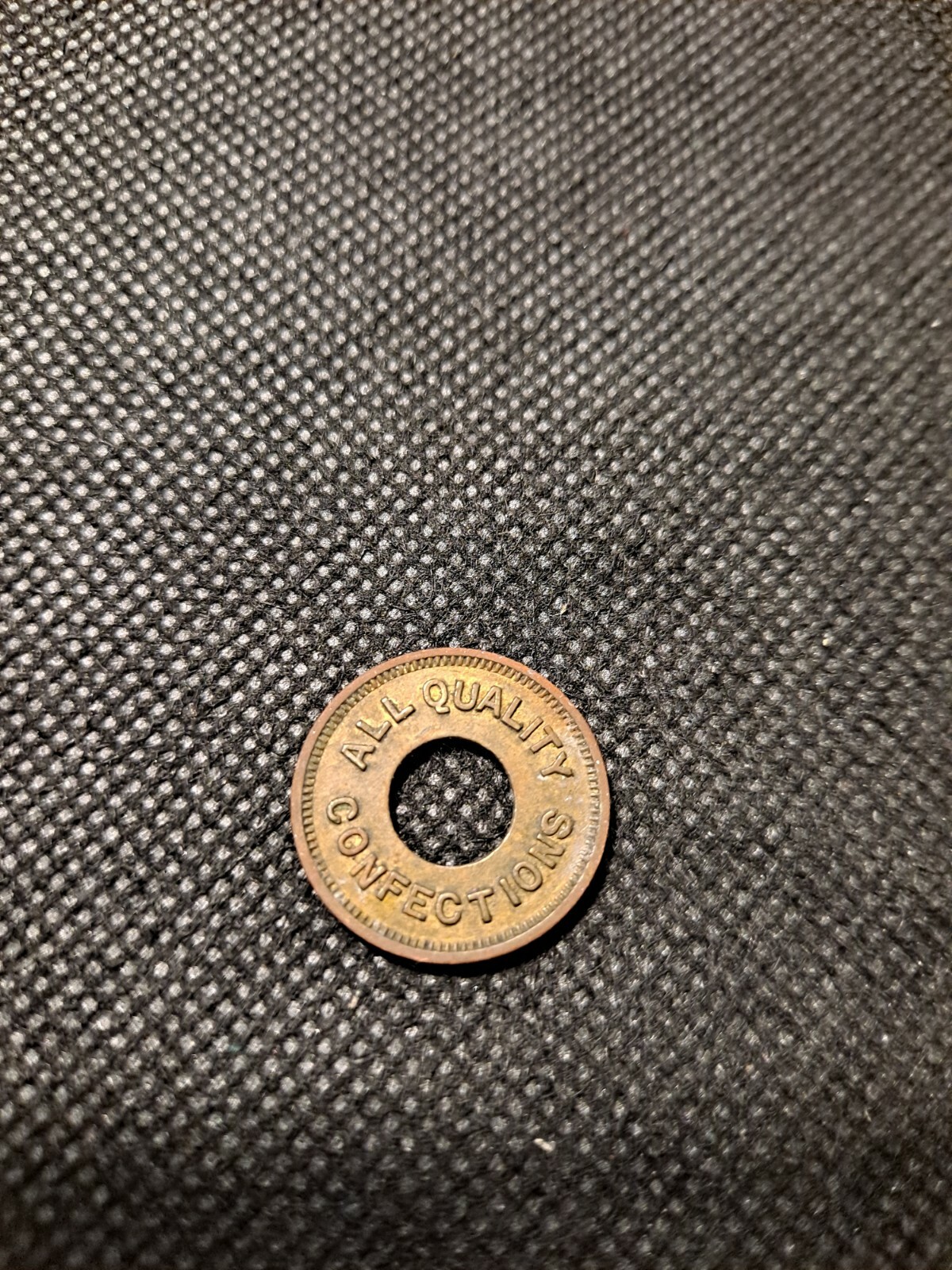 ALL QUALITY CONFECTIONS GOOD FOR 5 CENTS PACKAGE OF CANDY TOKEN ...