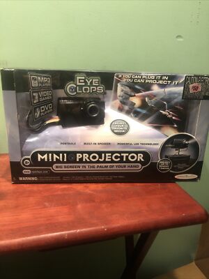 Jakks Pacific EyeClops Mini LED Projector Portable For Up to 60" Screen ...