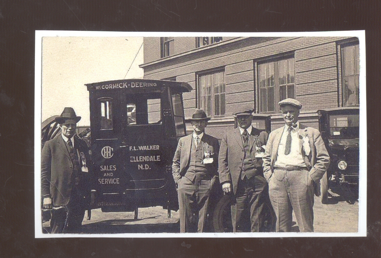 REAL PHOTO ELLENDALE NORTH DAKOTA JOHN DEERE ADVERTISING CAR POSTCARD ...