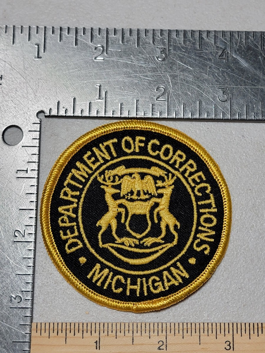 Insignia Del Departamento De Correcciones De Michigan