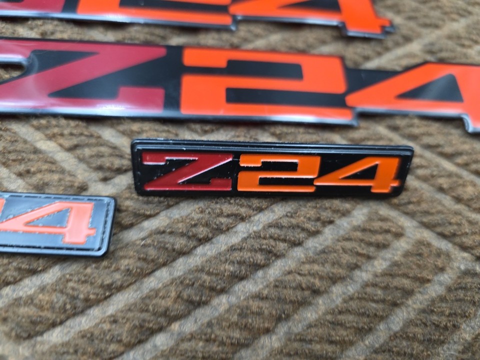 OEM 1988-1990 CHEVROLET CAVALIER Z24 DOOR PANEL / GROUND EFFECT EMBLEM ...