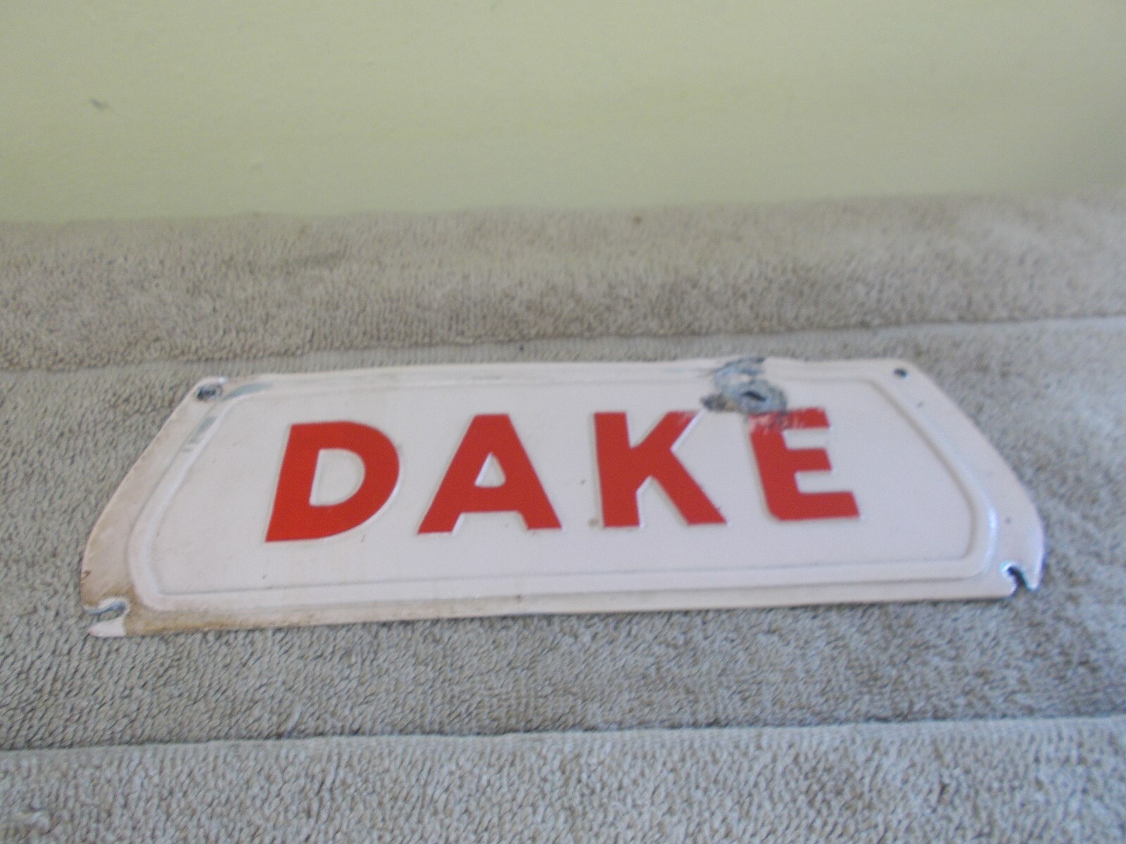 VINTAGE DAKE SIGN ADVERTIZING STORE GAS OIL ICE CREAM EMBOSSED NAME TAG ...