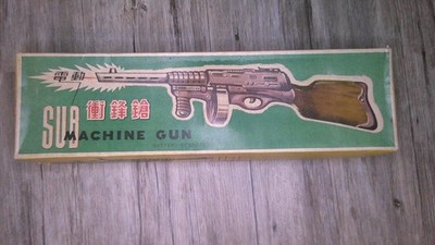 1960's toy tin Litho sub machine gun original box attached w/ cloth to ...
