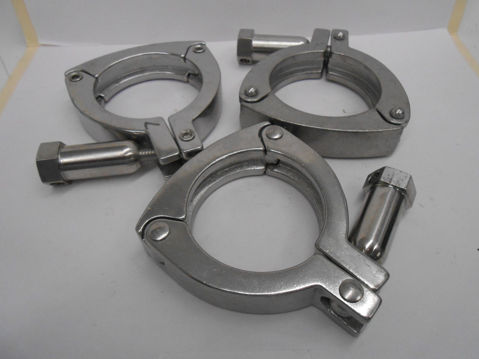 LOT OF THREE 2" 3 SEGMENT SANITARY CLAMPS WITH HEX NUT FOR 2.516" O.D ...