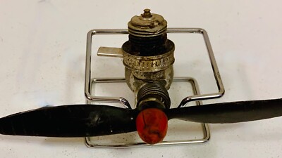 Collectible Cox .049 model airplane engine with Quit Zone Muffler ...