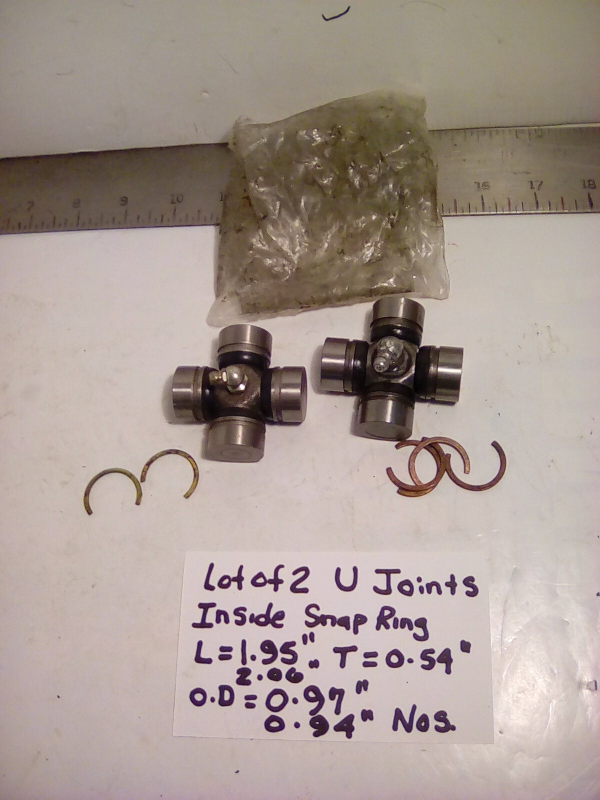 2 EA. UNIVERSAL JOINTS. INSIDE SNAP RING STYLE. LENGTH = 1.95 ...