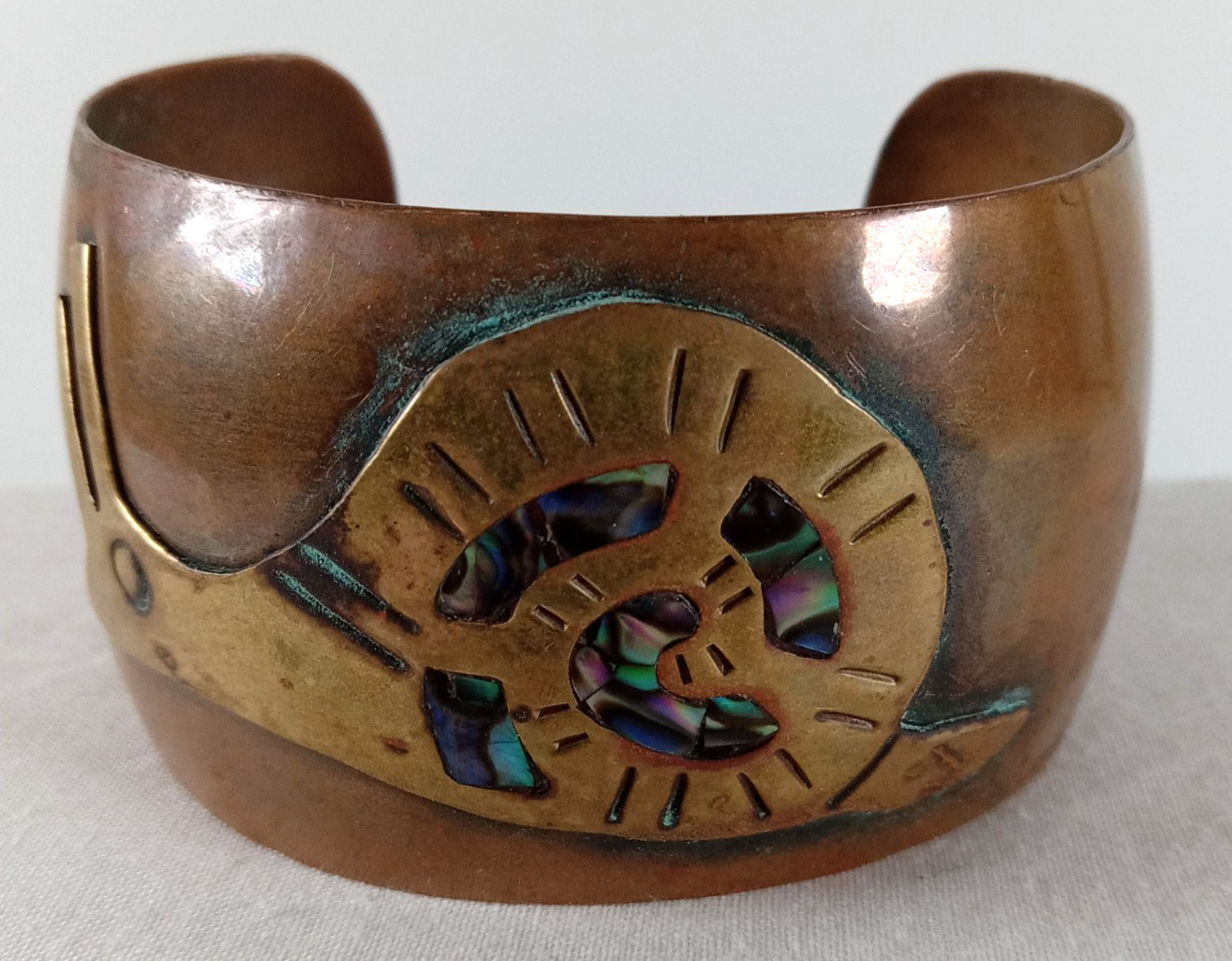Wide copper cuff with applied brass and abalone snail… - Gem