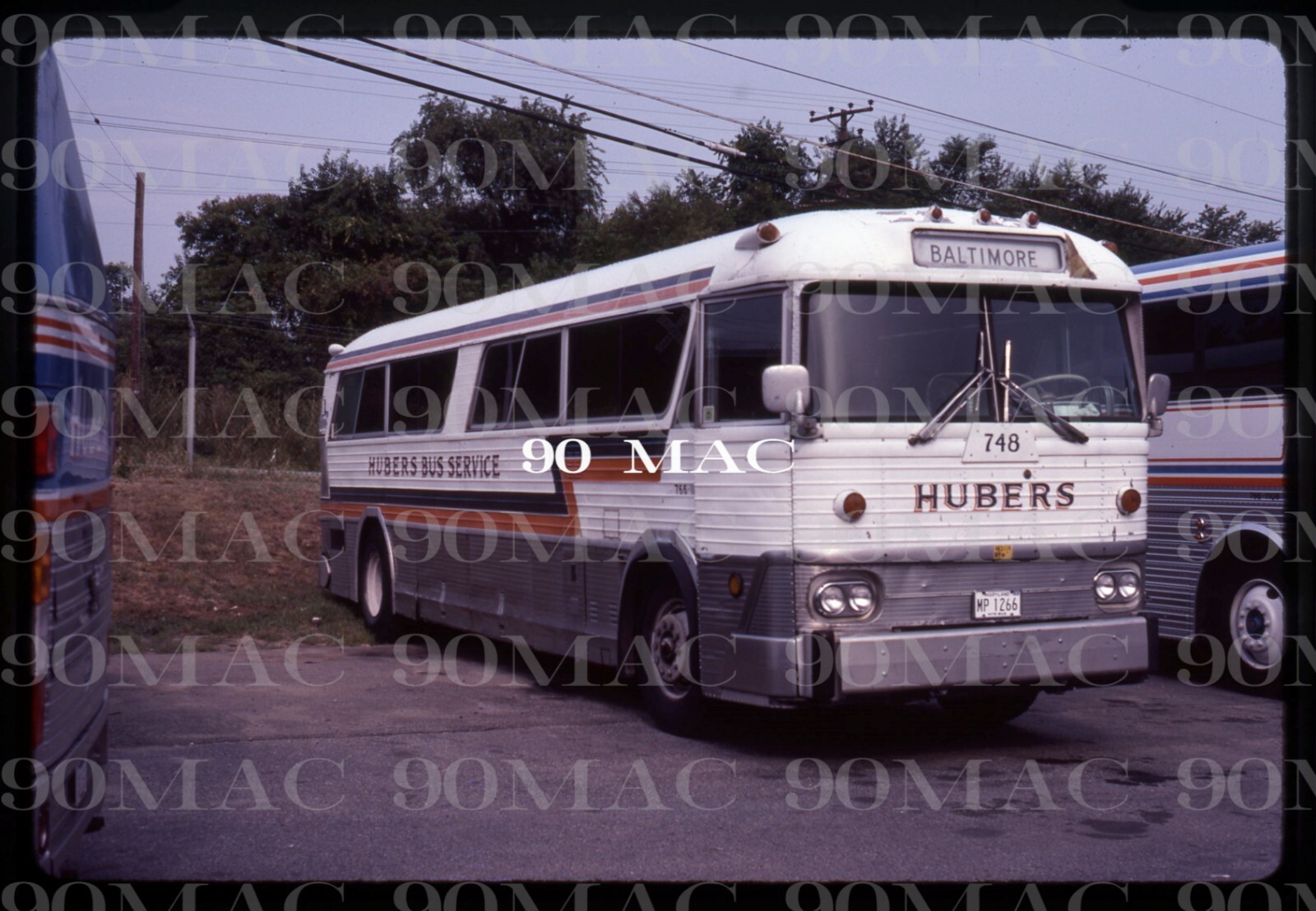 HUBER'S BUS SERVICE. MCI COACH Bus #748. Baltimore (MD). Original Slide ...