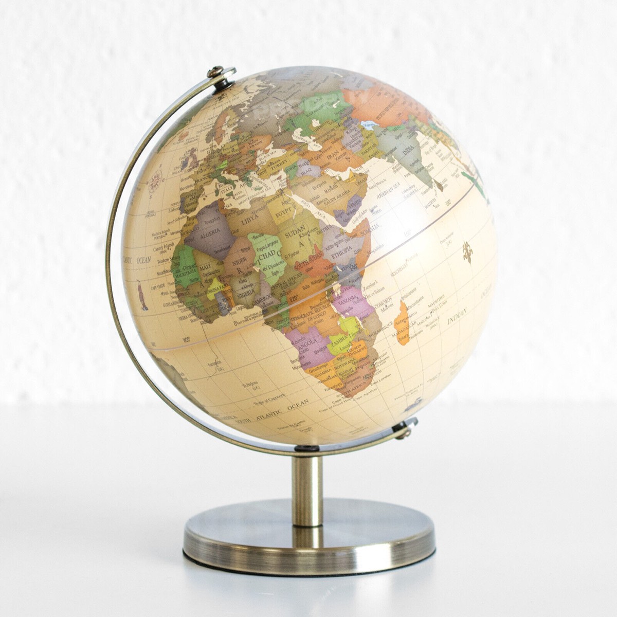 Spinning Rotating Globe White And Gold Rotating Globe | Solar Powered