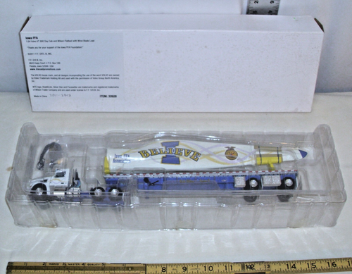 ERTL FFA VOLVO VT800 WILSON FLATBED WITH WIND BLADE 2001 SEMI TRUCK 1: ...