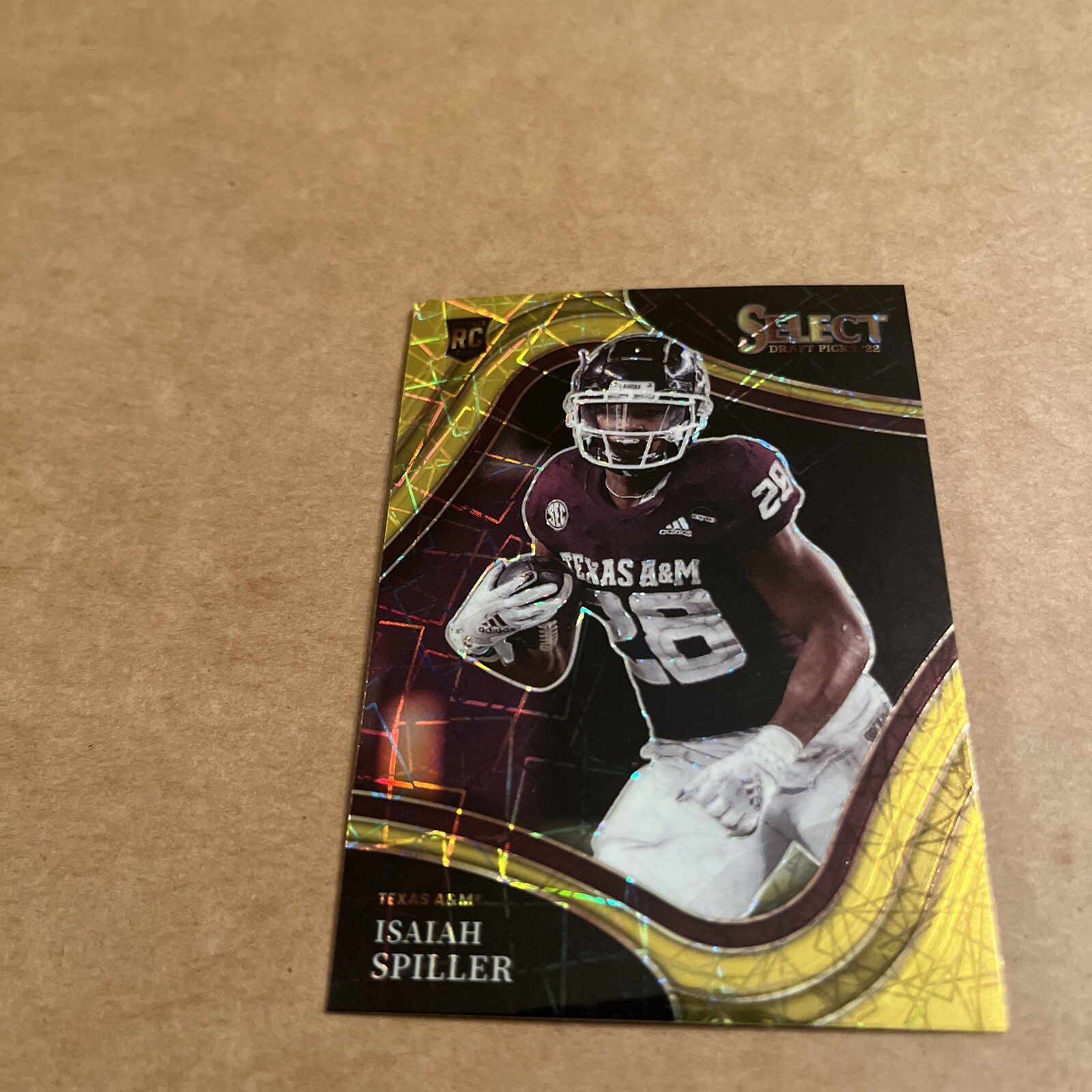 2022 Select Isaiah Spiller Chargers Rookie Yellow Lazer Prism Field ...