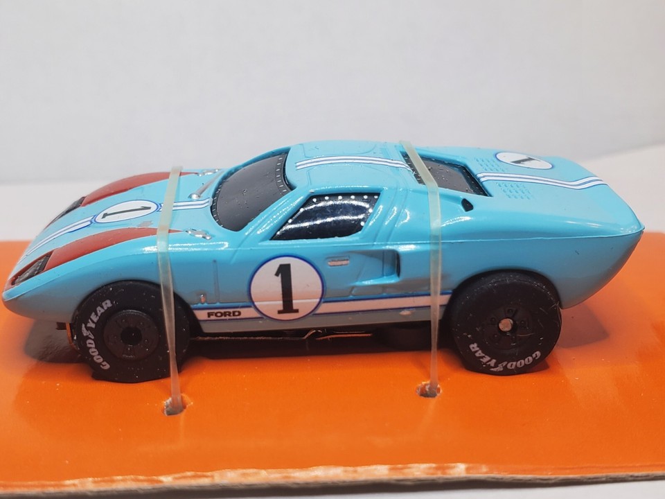 FORD vs FERRARI HO SLOT CARS...MILES vs BANDINI GT 40 vs FERRARI TJJET ...