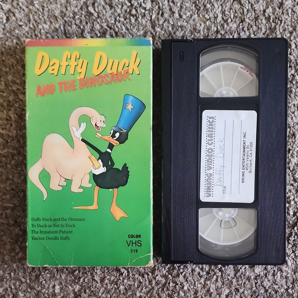 Troy Gold Daffy Duck and the Dinosaur VHS Animation | eBay