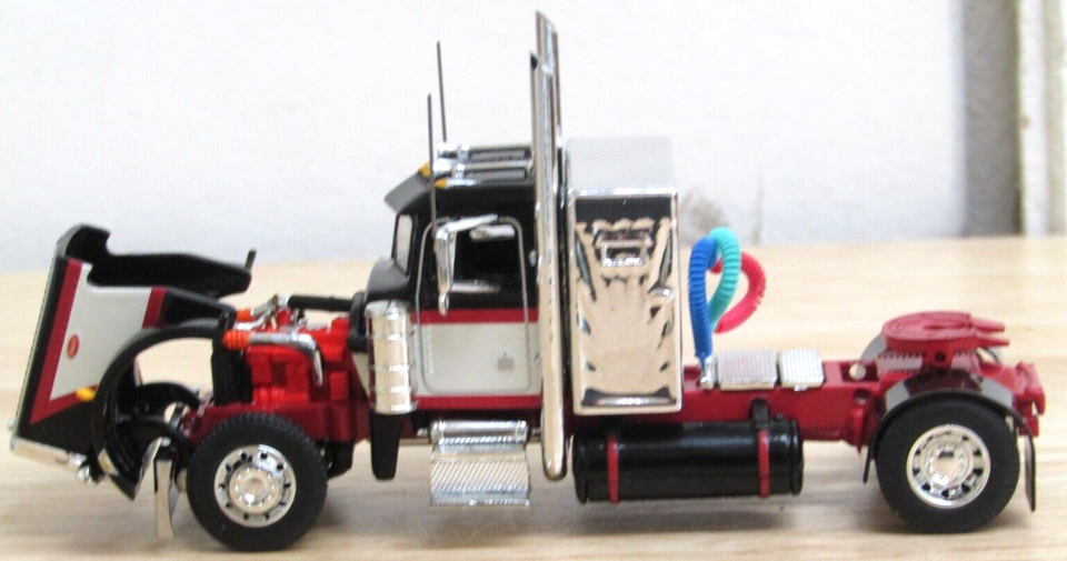 DCP Custom black/white Peterbilt 359 34" Mercury bunk single axle ...