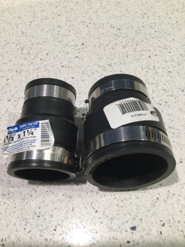Two Fernco Flexible Coupling 1 1/2" x 1-1/4" P1056-150/125, other is ...