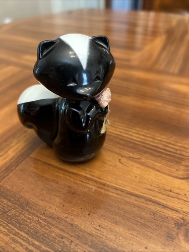 Sweet Honesty Avon Cute Little Skunk Bottle Vintage Holding Flowers ...